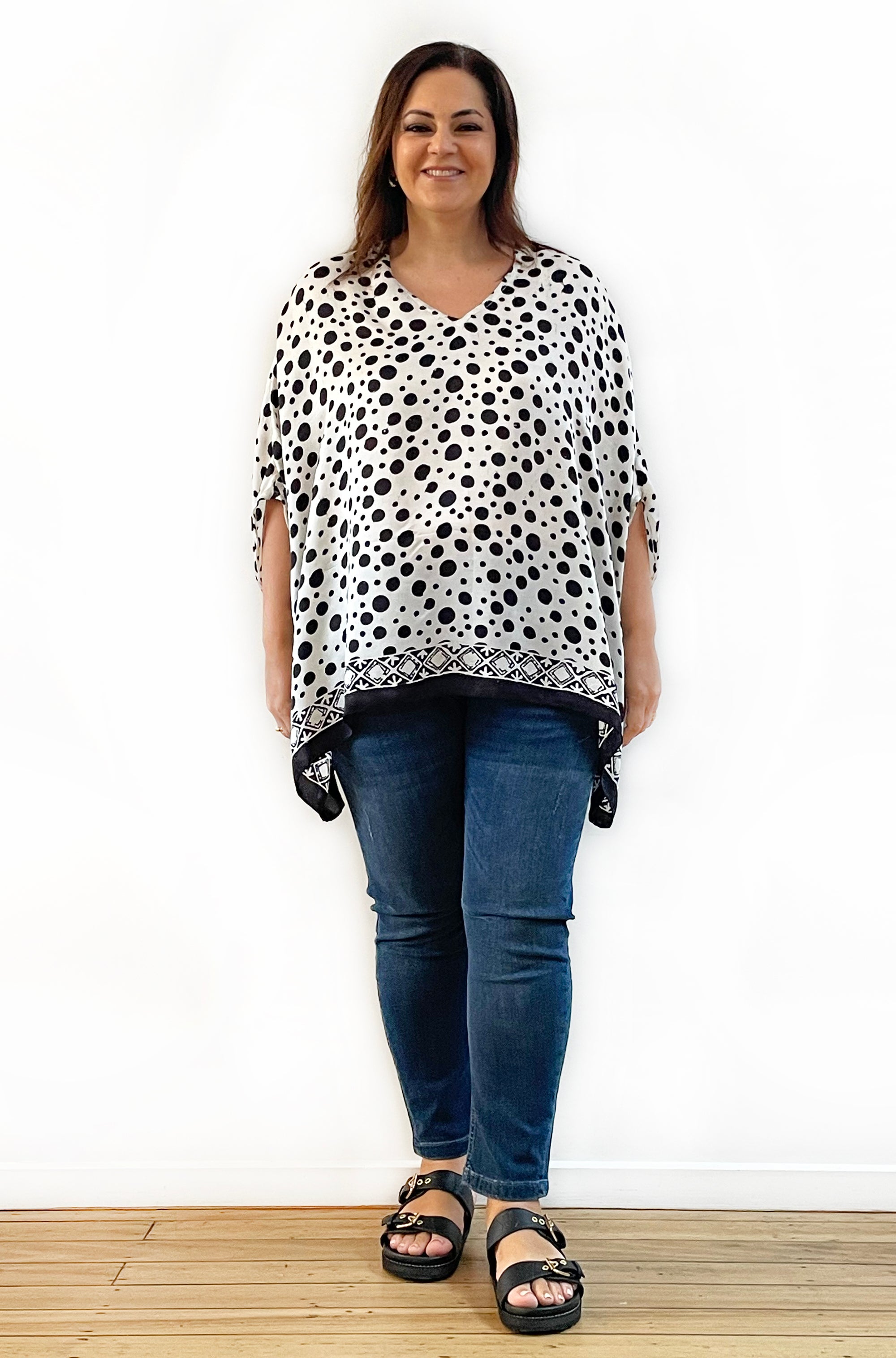 SILK PONCHO IN BLACK AND IVORY SPOT PRINT